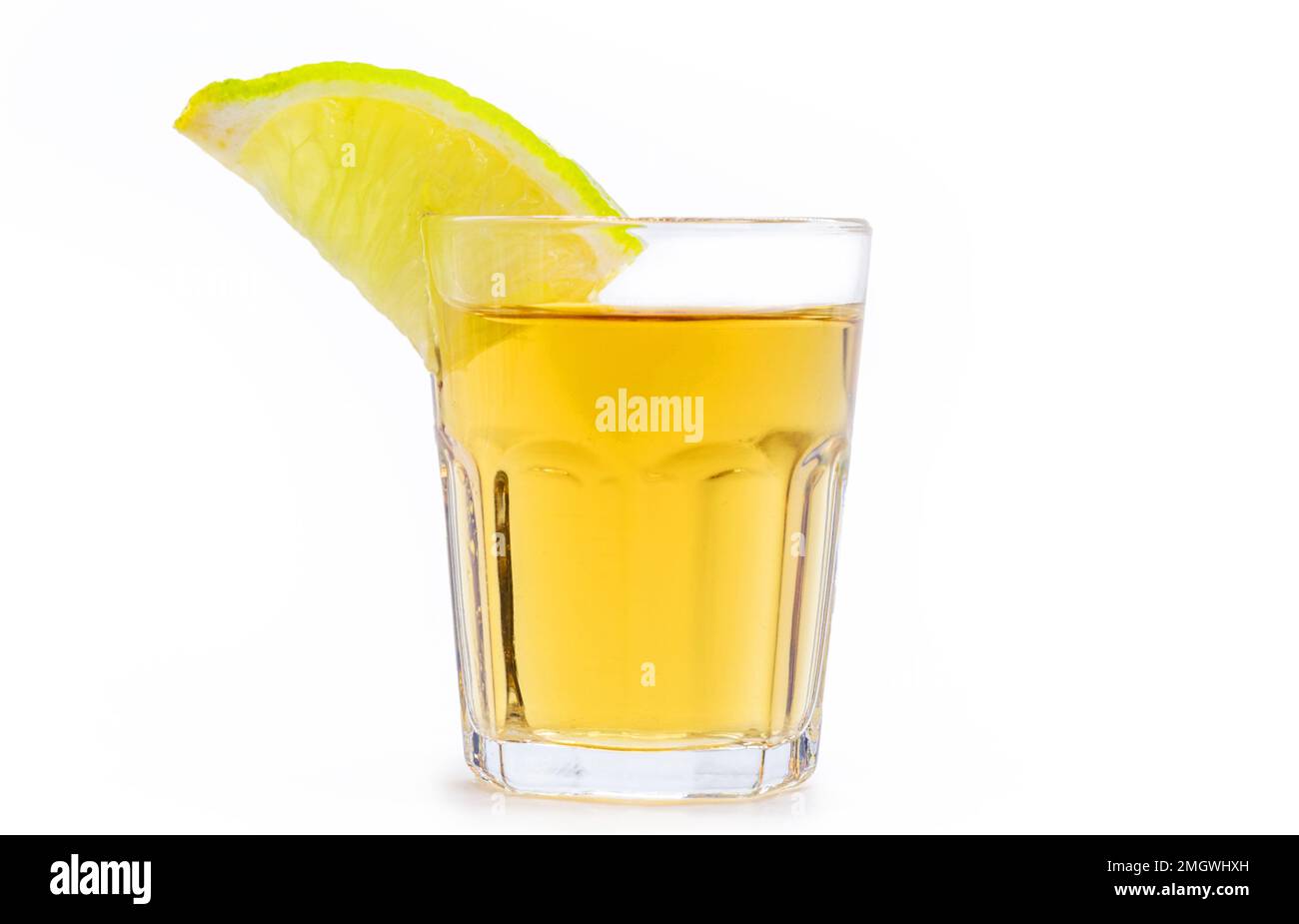 glass of alcoholic drink with lemon, distilled from sugar cane, called ...