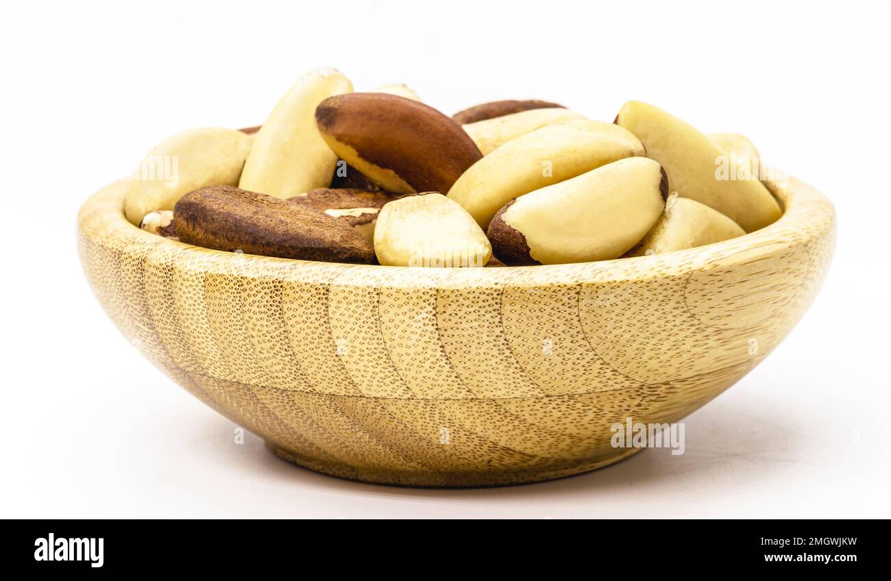 bowl with brazilian chestnut, on white insulator background. Brazil ...