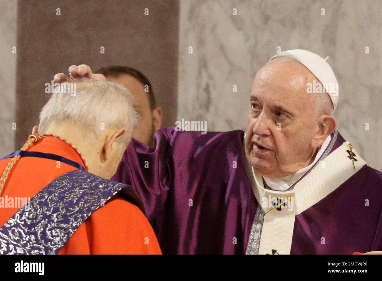 Pope Francis puts ashes on the forehead of Cardinal Jozef Tomko in the ...