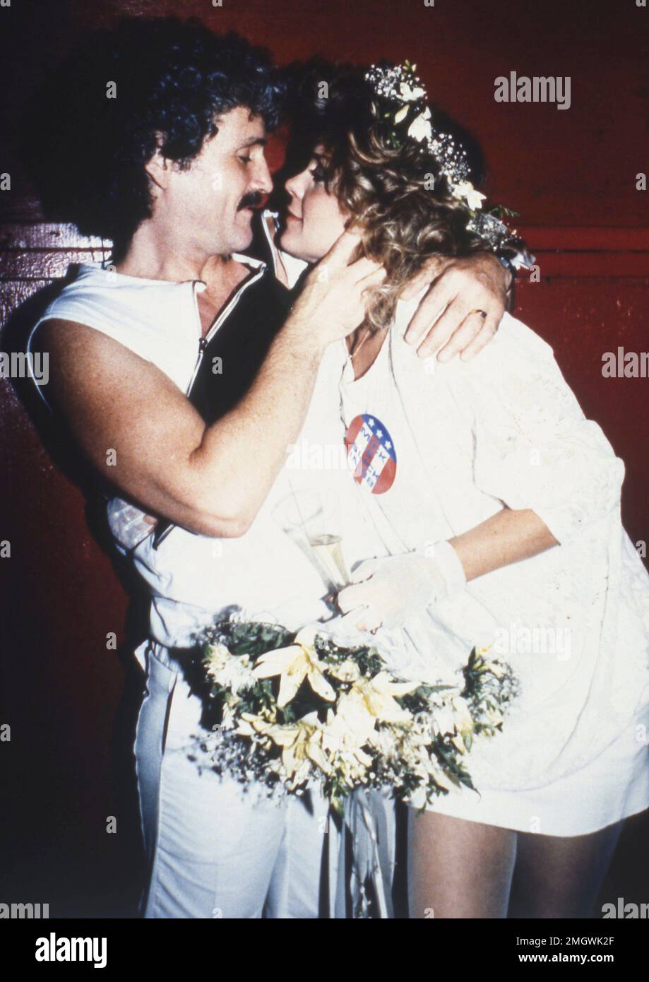 Jefferson Starship members David Freiberg and J.B. Logan hug after they ...