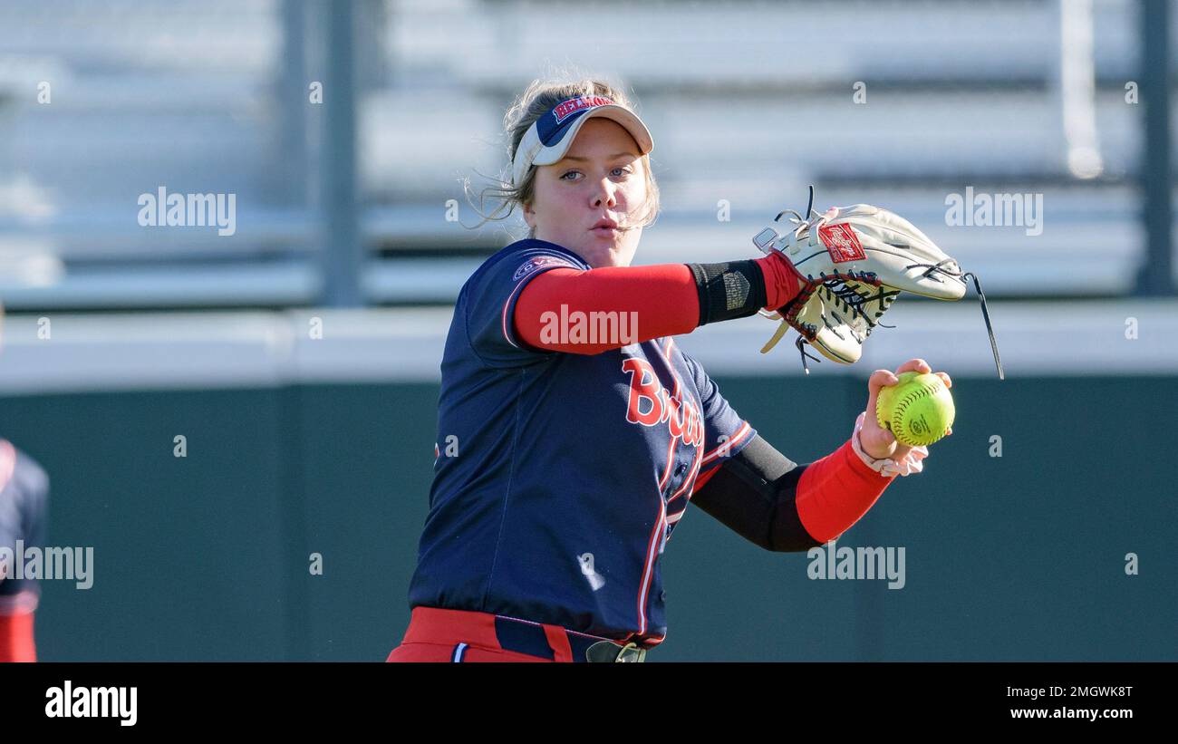 Belmont outfielder Molly Porter throws during an NCAA softball game ...