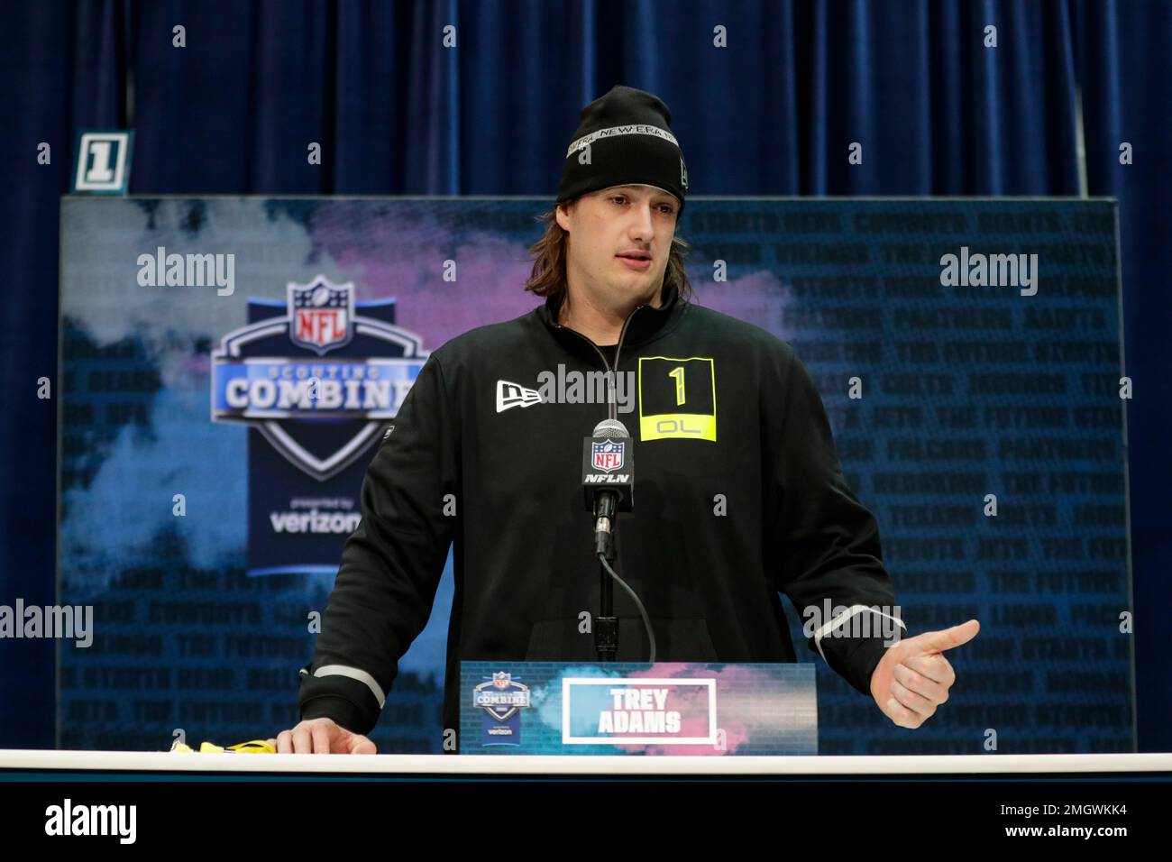 Washington offensive lineman Trey Adams speaks during a press ...