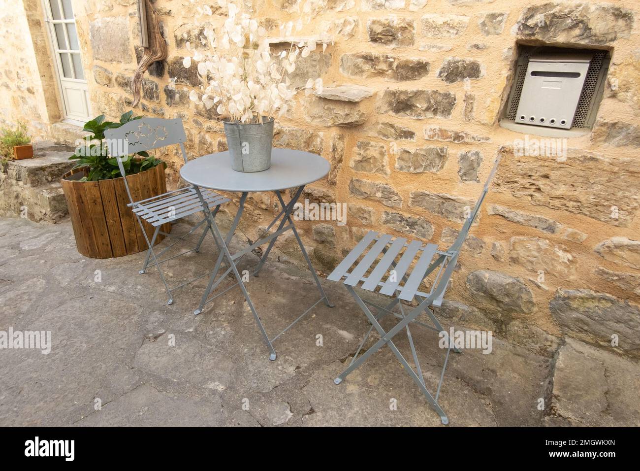 metal grey chair seat table gray in summer in street in ancient ...