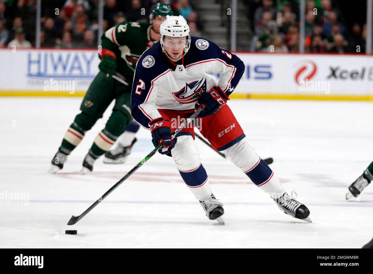 Columbus Blue Jackets defenseman Andrew Peeke plays against the Minnesota Wild during an NHL ...