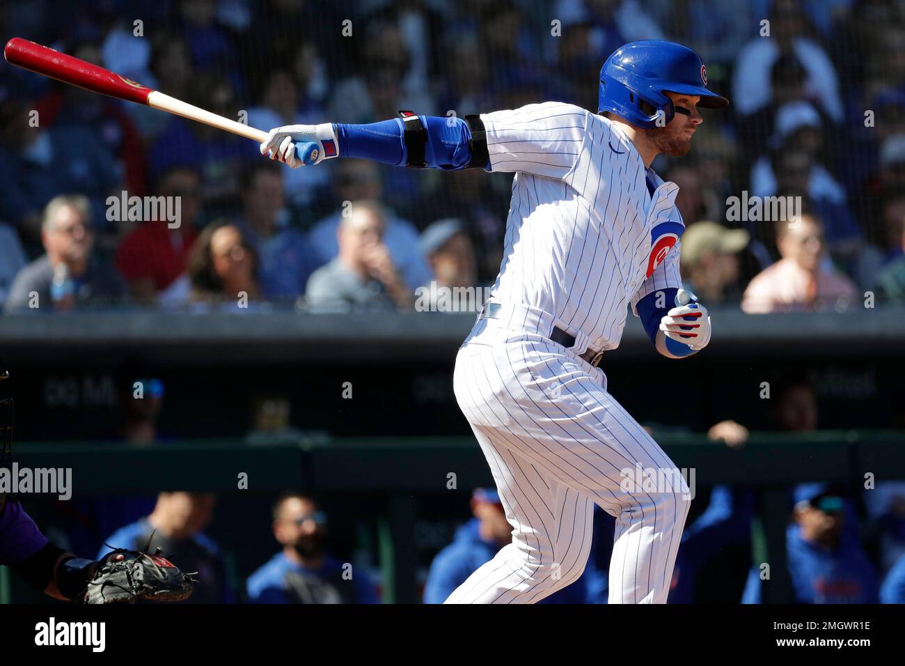 Chicago Cubs' Ian Happ hits during the first inning of a spring ...