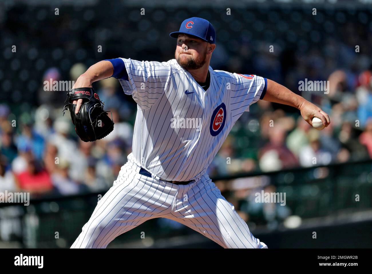 Chicago Cubs pitcher Jon Lester throws during the first inning of a ...