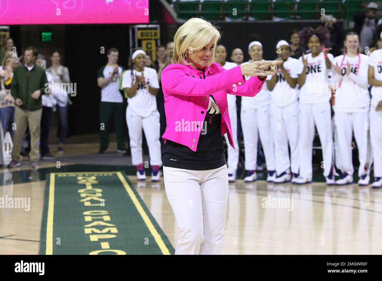 Baylor head coach Kim Mulkey points to her family as she is introduced ...