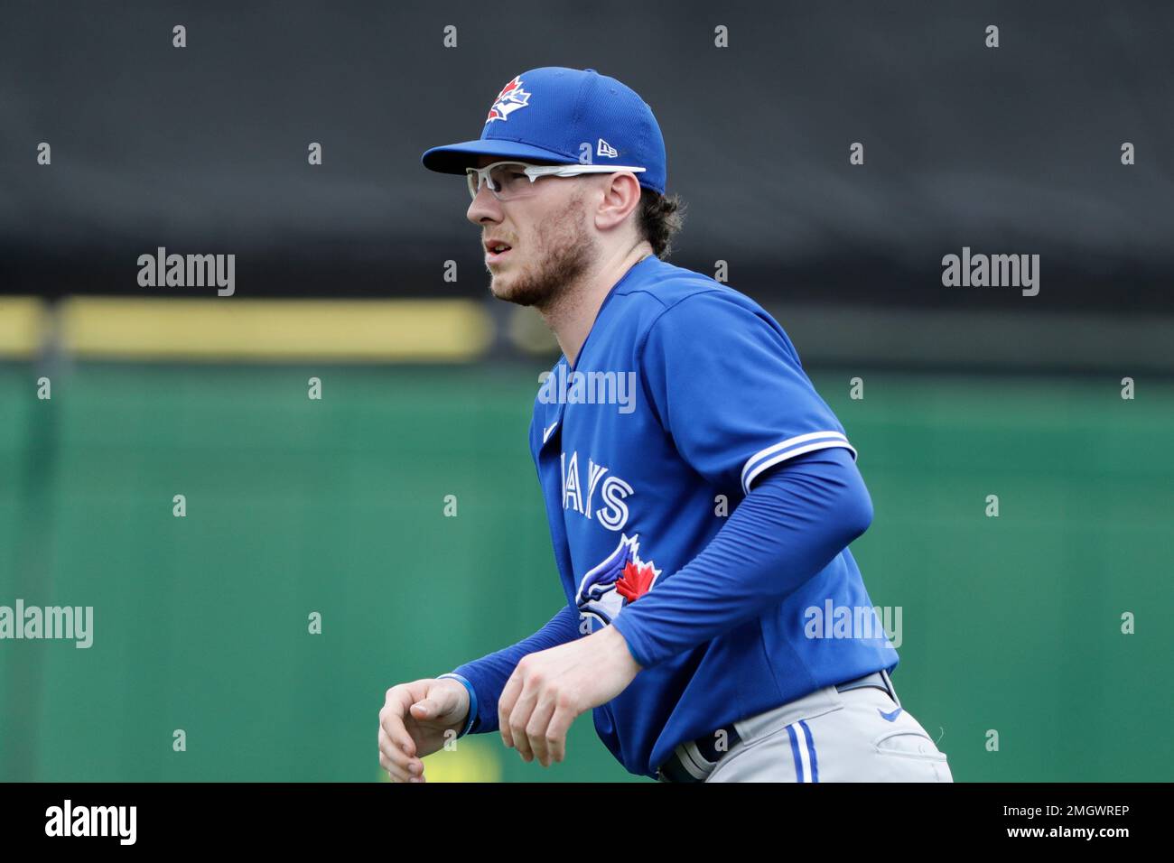 Toronto Blue Jays' Danny Jansen (9) warms up before a spring training ...