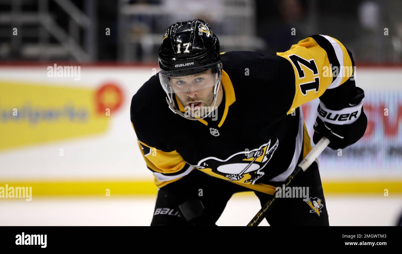 Pittsburgh Penguins' Bryan Rust prepares for a face-off during the team ...