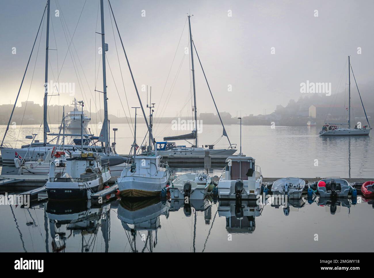 Moonlight over sailing boats at Reine, Moskenesøya, Lofoten Islands ...
