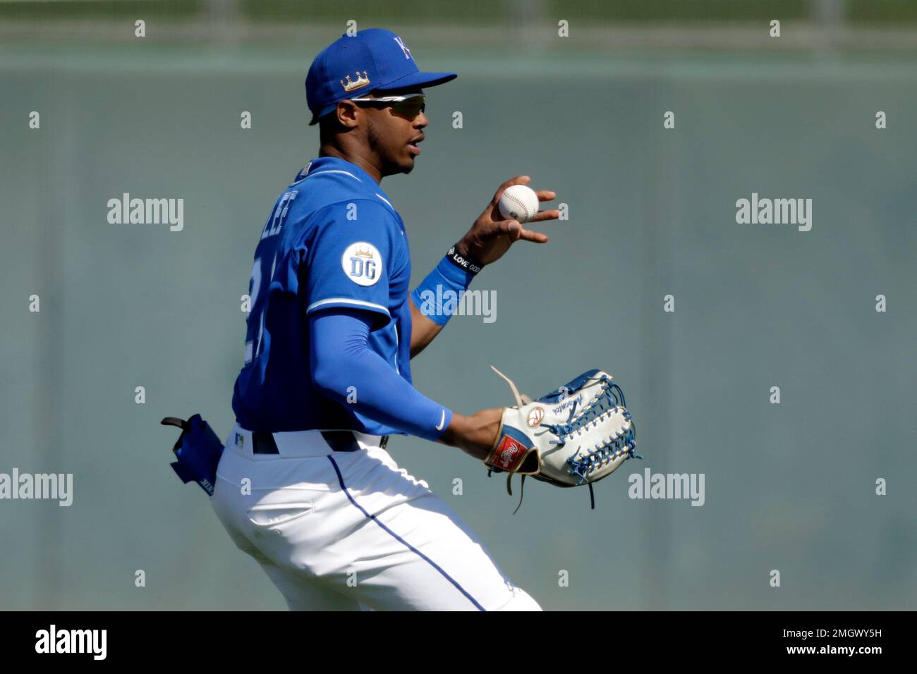 Kansas City Royals left fielder Khalil Lee fields a ball during the ...