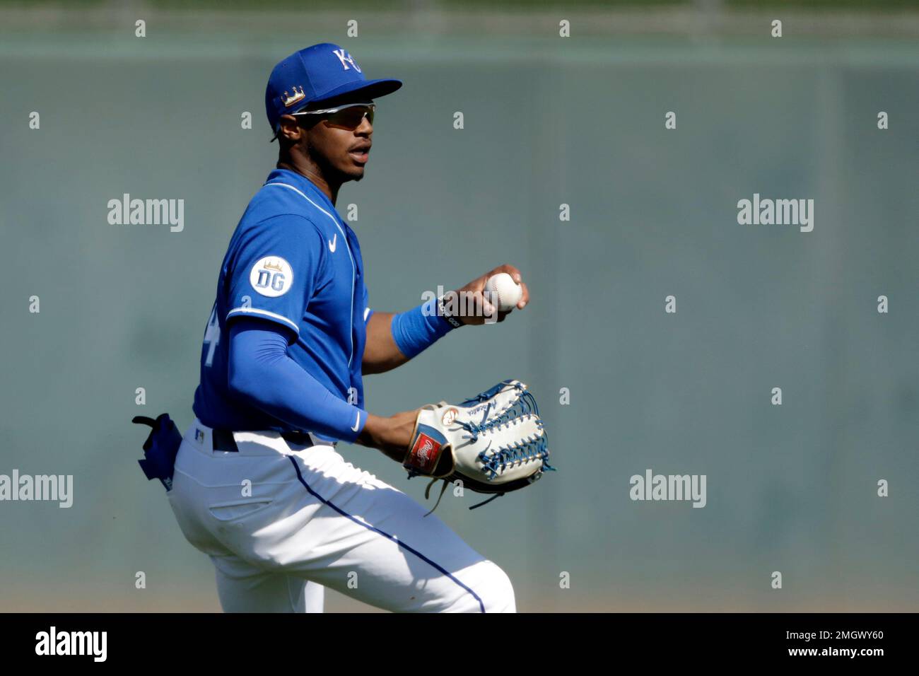 Kansas City Royals left fielder Khalil Lee fields a ball during the ...