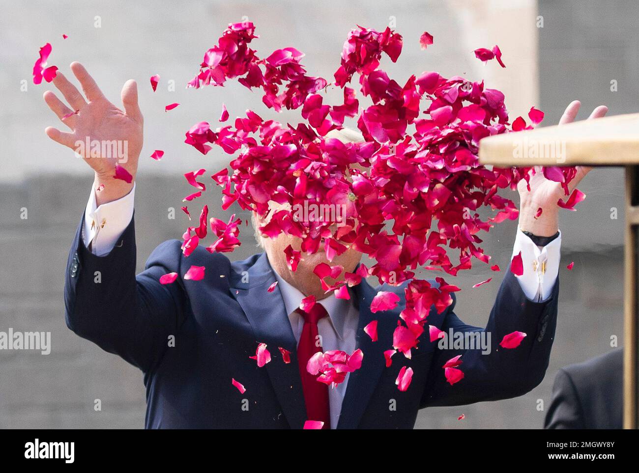 U.S. President Donald Trump offers floral respects at Raj Ghat, the ...