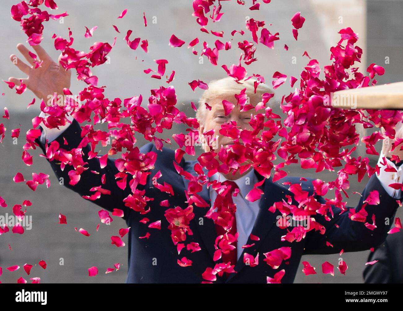 U.S. President Donald Trump offers floral respects at Raj Ghat, the ...