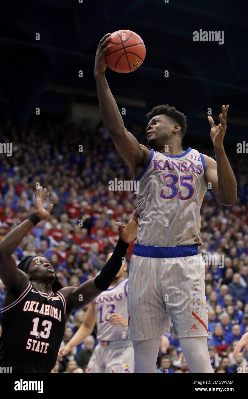 Kansas center Udoka Azubuike (35) and Oklahoma State guard Isaac ...