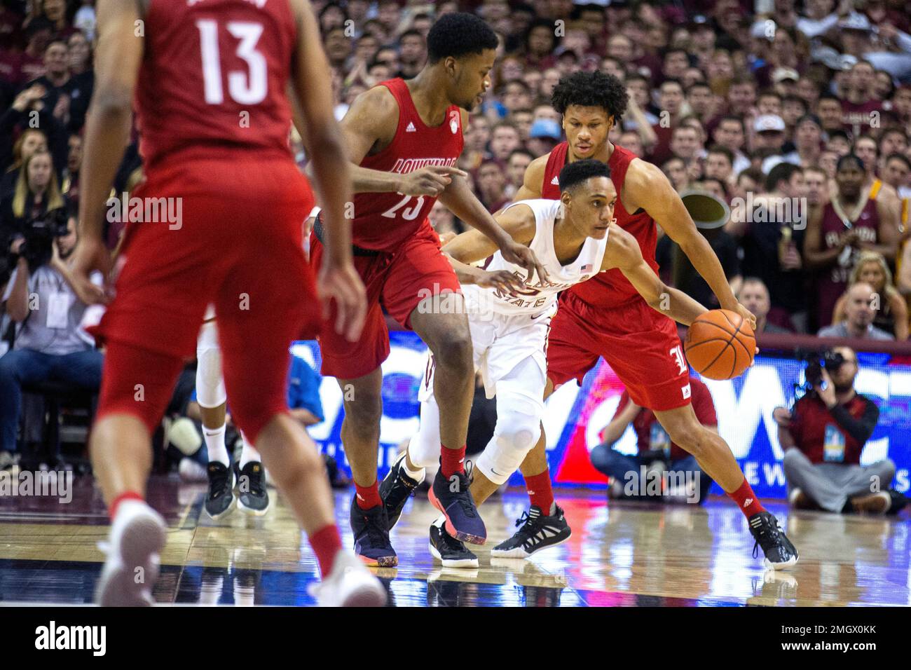 Florida State guard Devin Vassell (24) brings the ball upcourt through ...