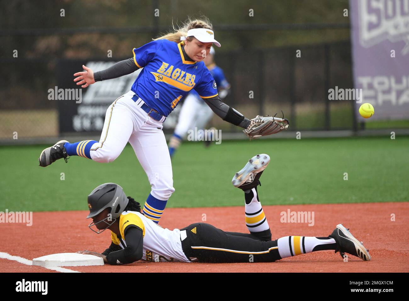 Morehead State infielder Kirya Kingery tries to tag out Southern ...