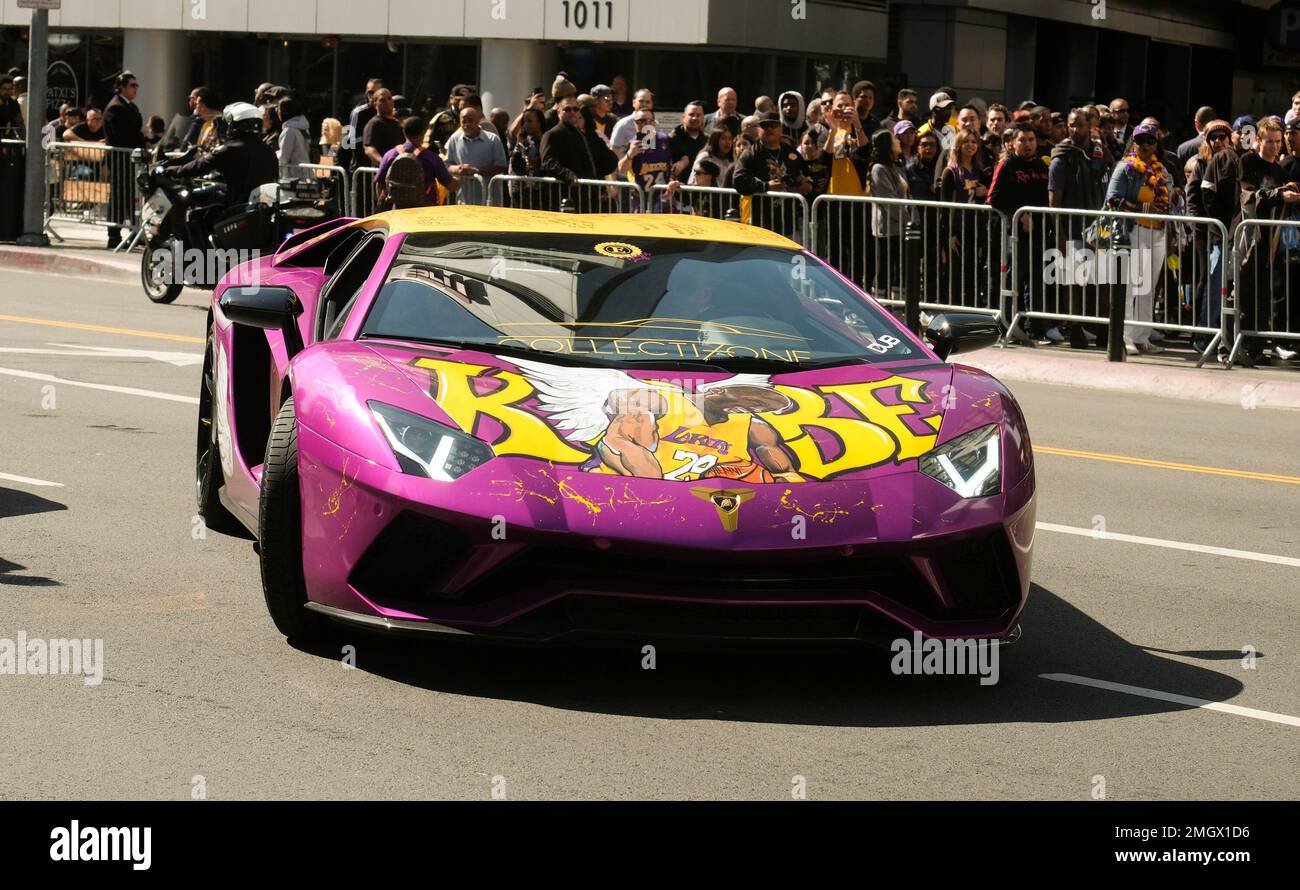 A car painted in memory of Kobe Bryant as fans leave the Staples Center ...