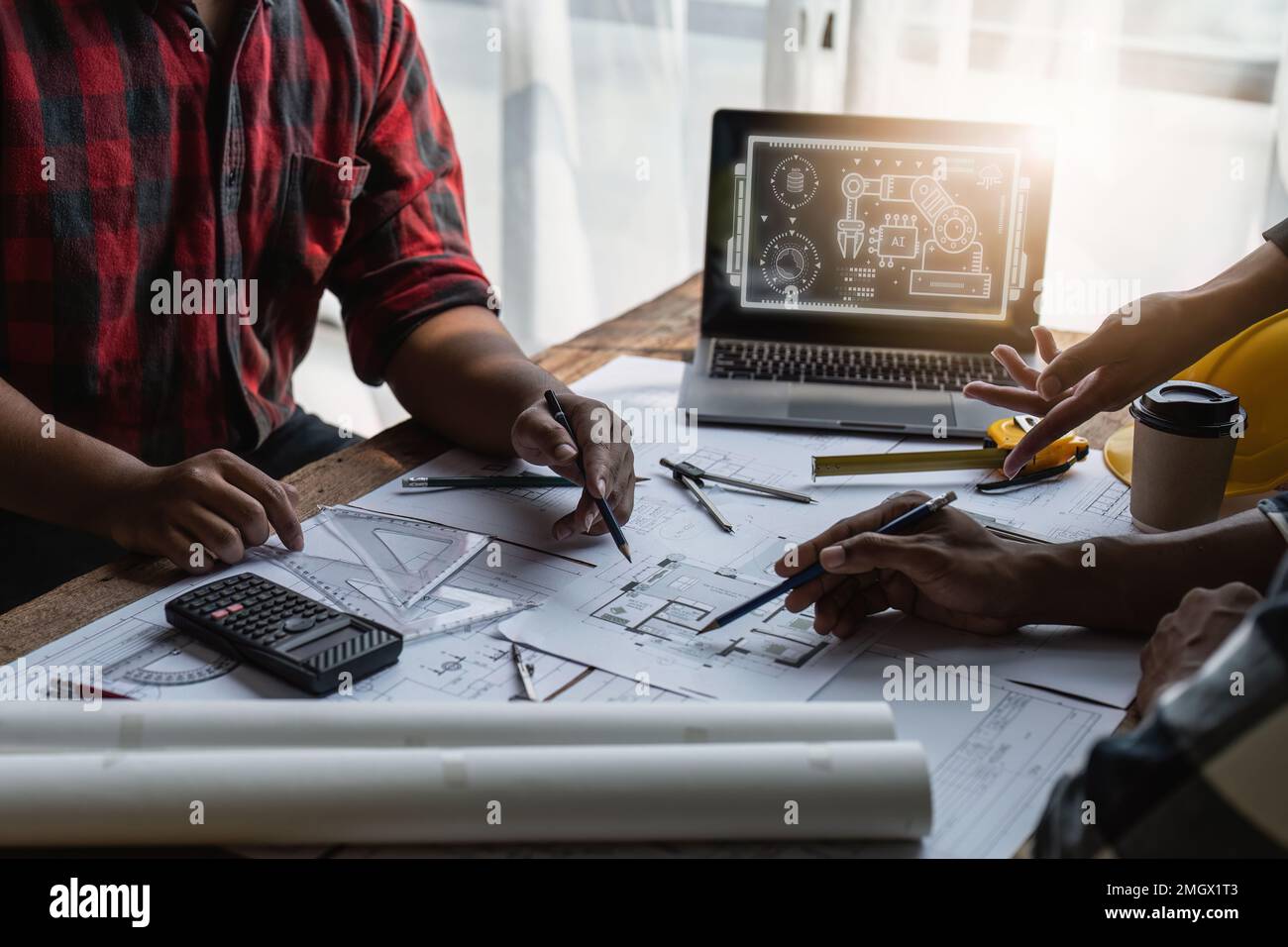 Close up of Architect team working with house model for architectural ...