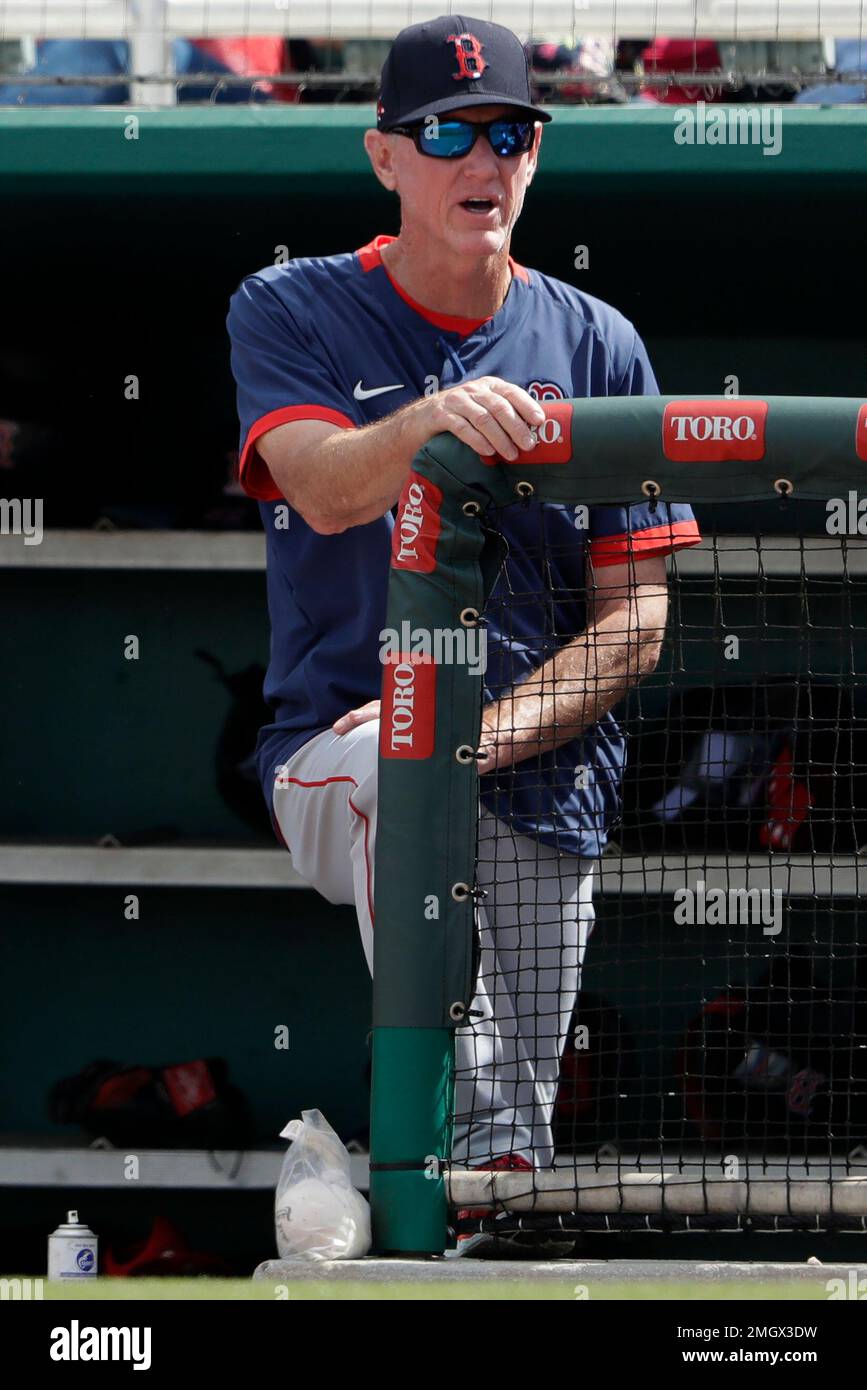 Boston Red Sox manager Ron Roenicke watches from the dugout during a ...