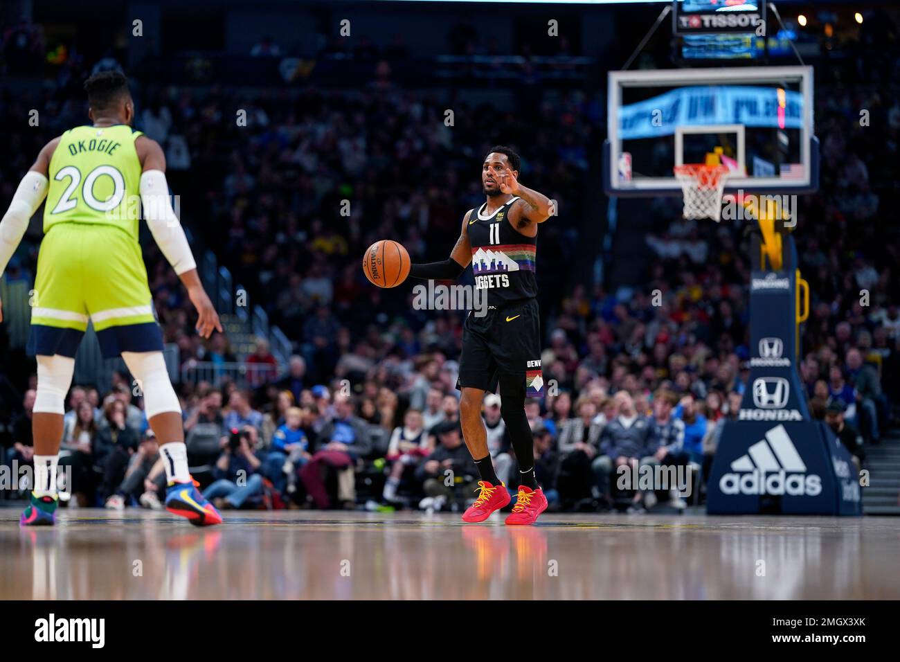 Denver Nuggets guard Monte Morris signals the play during an NBA ...
