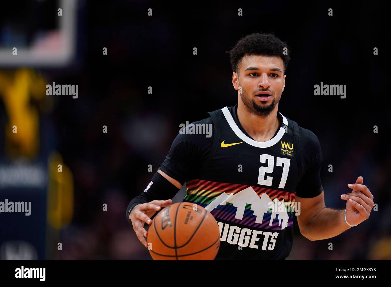 Denver Nuggets guard Jamal Murray moves the ball up court during an NBA ...