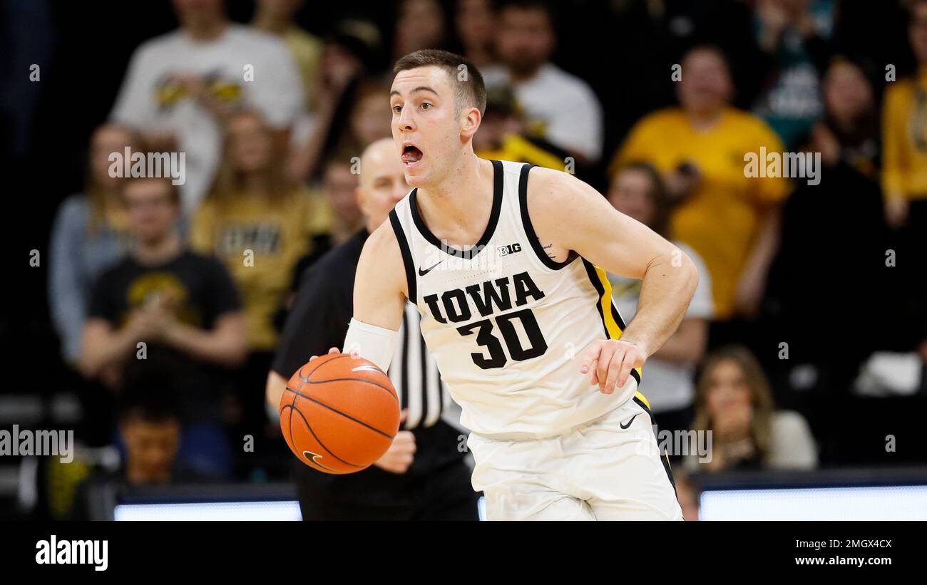 Iowa guard Connor McCaffery drives up court during the second half of ...