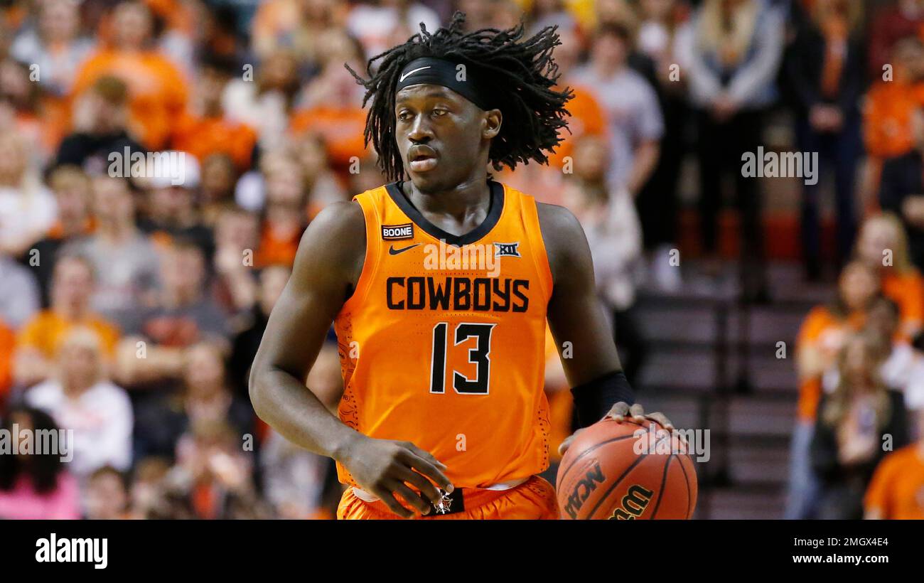 Oklahoma State guard Isaac Likekele (13) during an NCAA college ...