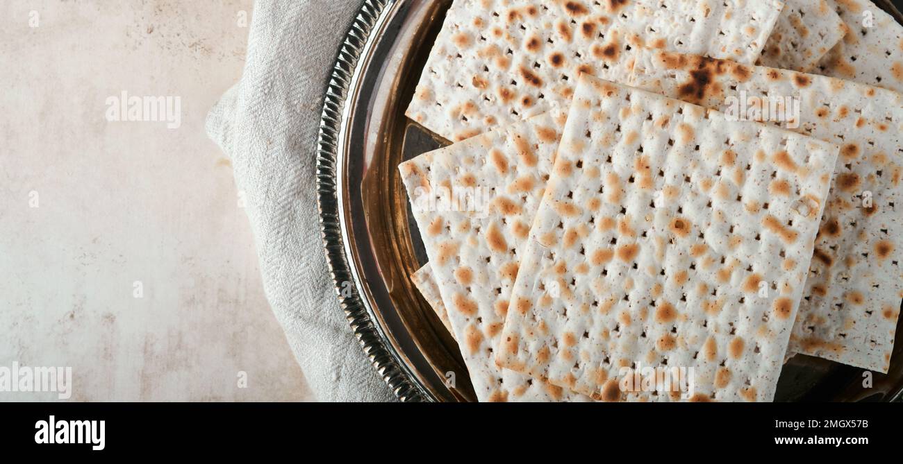 Passover celebration concept. Matzah, red kosher and walnut ...
