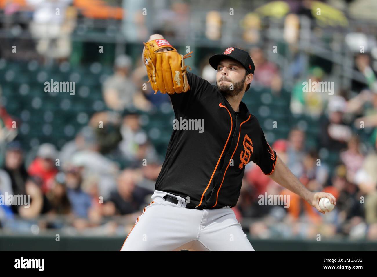 San Francisco Giants' Andrew Suarez throws during a spring training ...