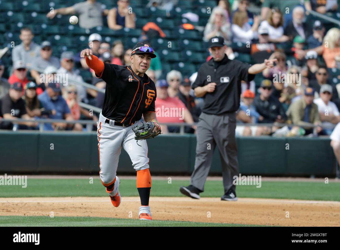 San Francisco Giants' Kean Wong throws during a spring training ...