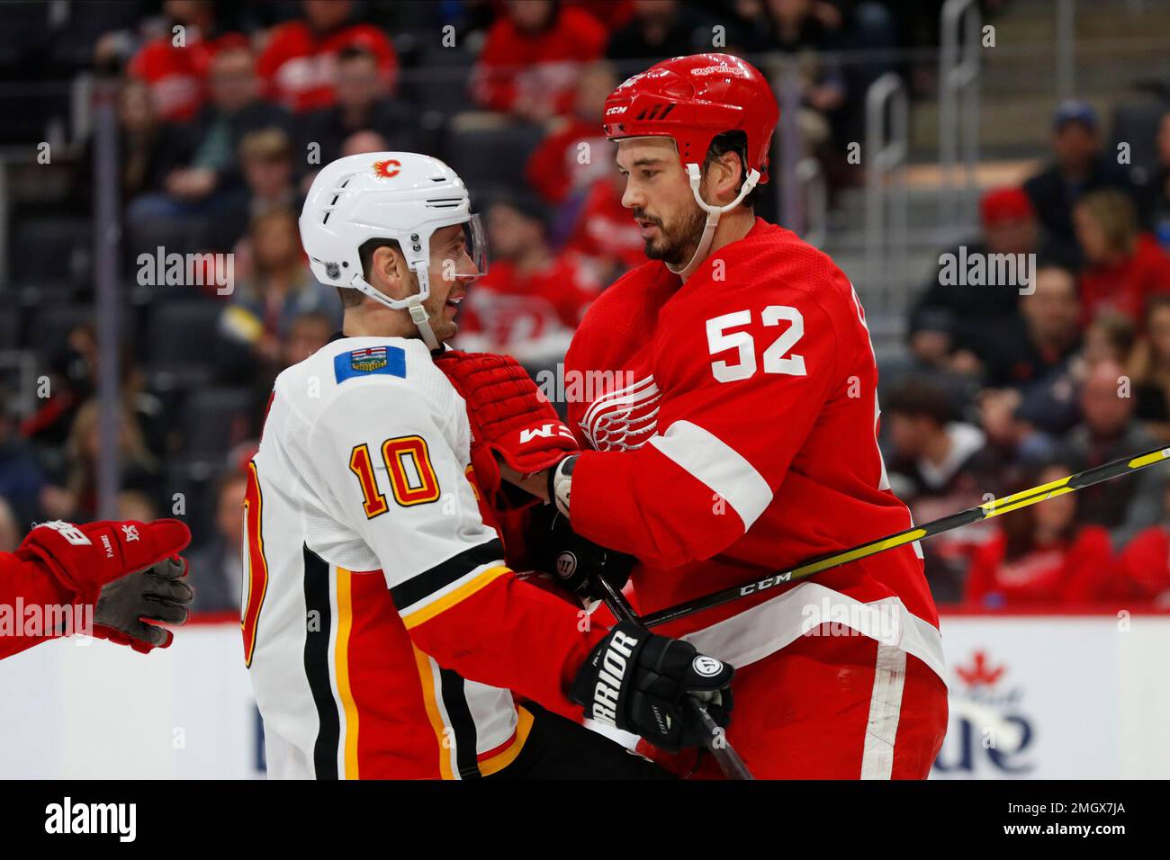 Calgary Flames center Derek Ryan (10) and Detroit Red Wings defenseman Jonathan Ericsson (52 ...