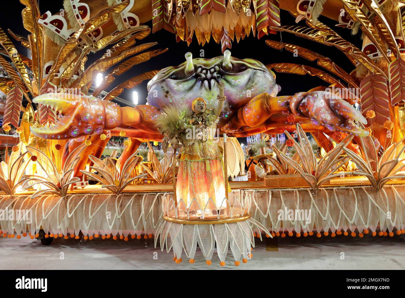 A performer from the Viradouro samba school parades on a float during ...