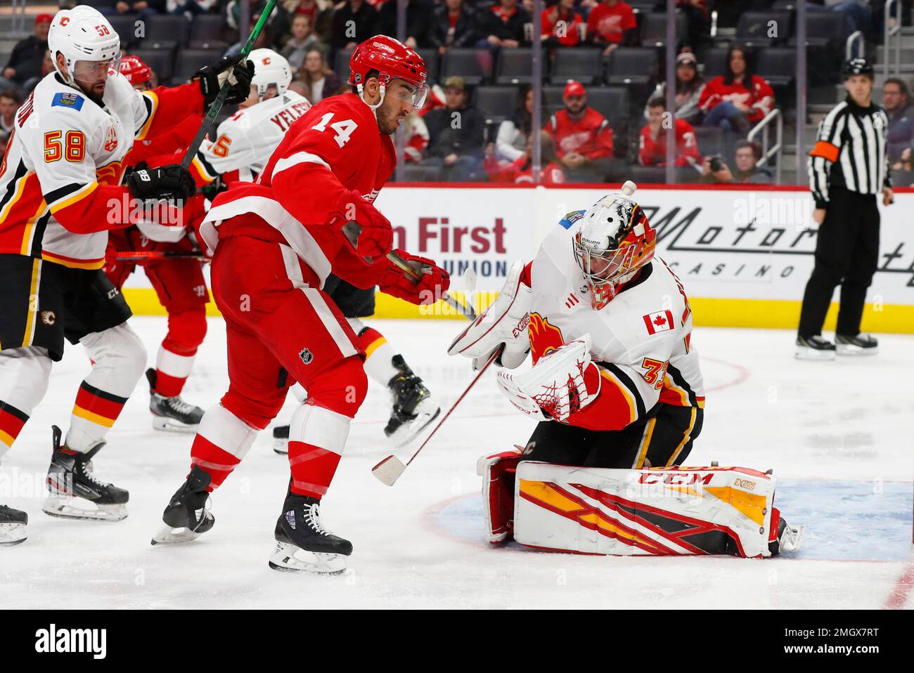 Calgary Flames goaltender David Rittich (33) stops a shot as Detroit ...
