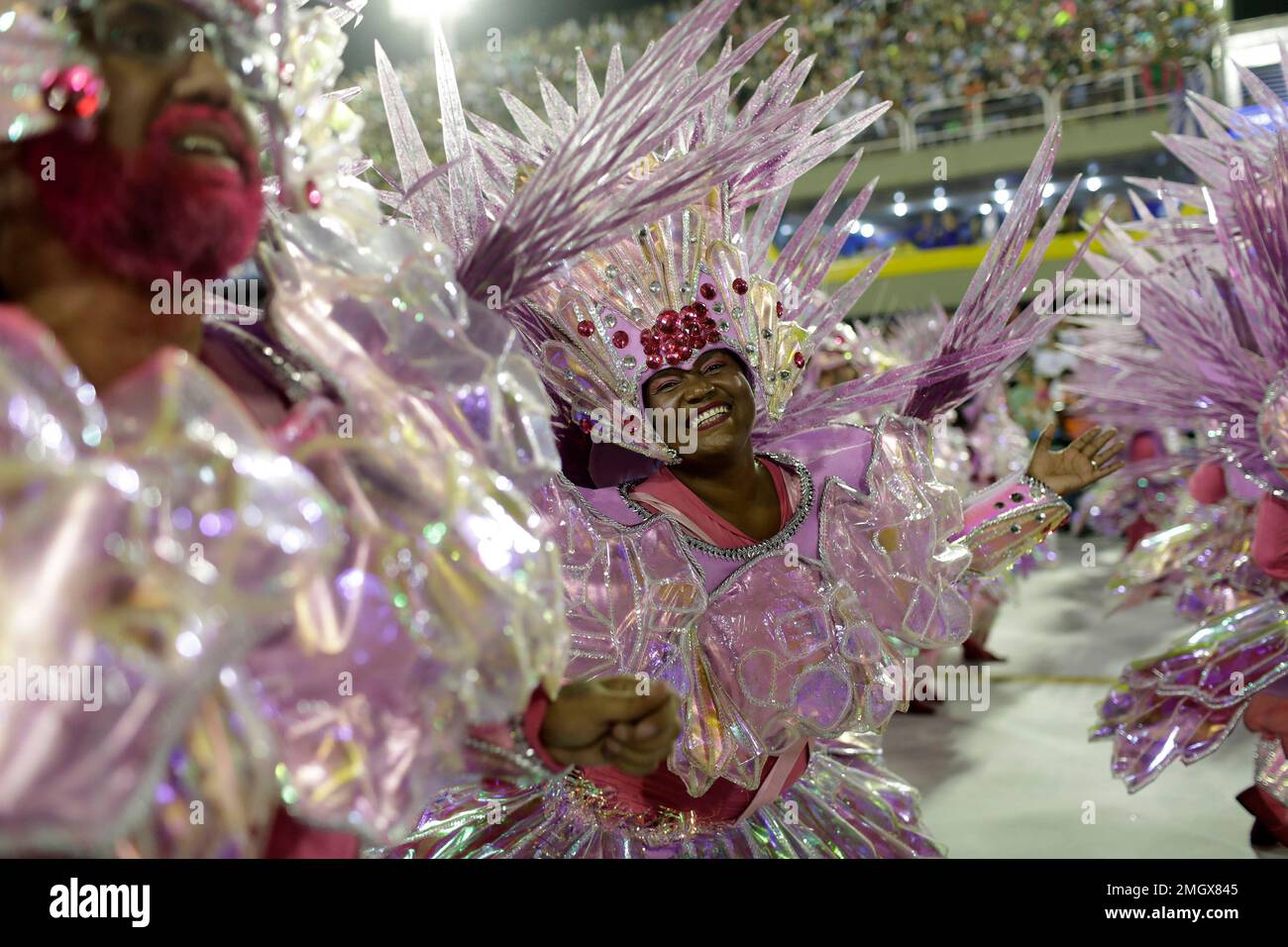 Performers from the Estacio de Sa samba school parade during Carnival ...