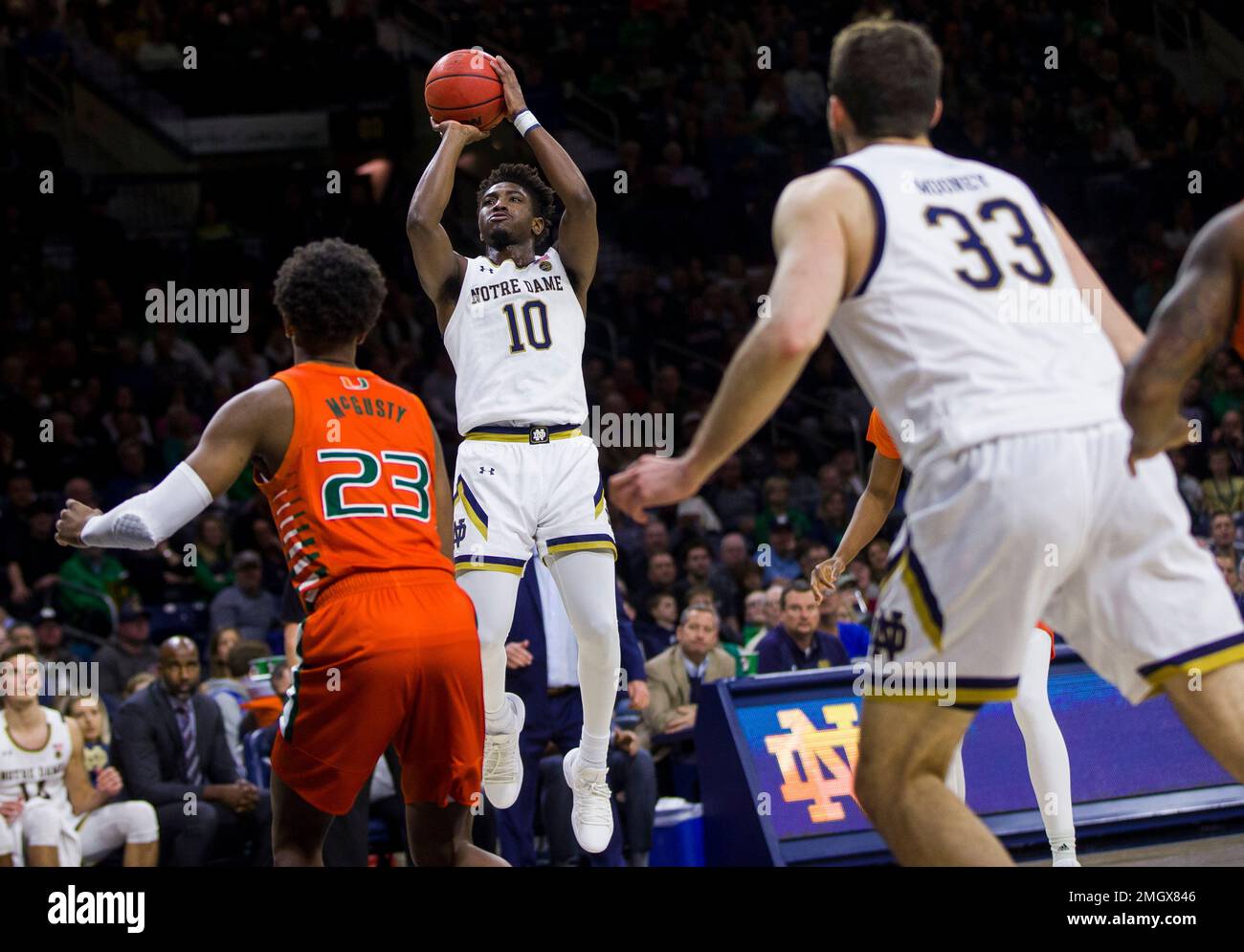 Notre Dame's Temple 'T.J.' Gibbs (10) goes up to shoot in front of ...
