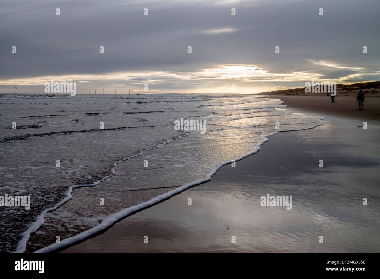 Walkers and wind turbine hi-res stock photography and images - Alamy