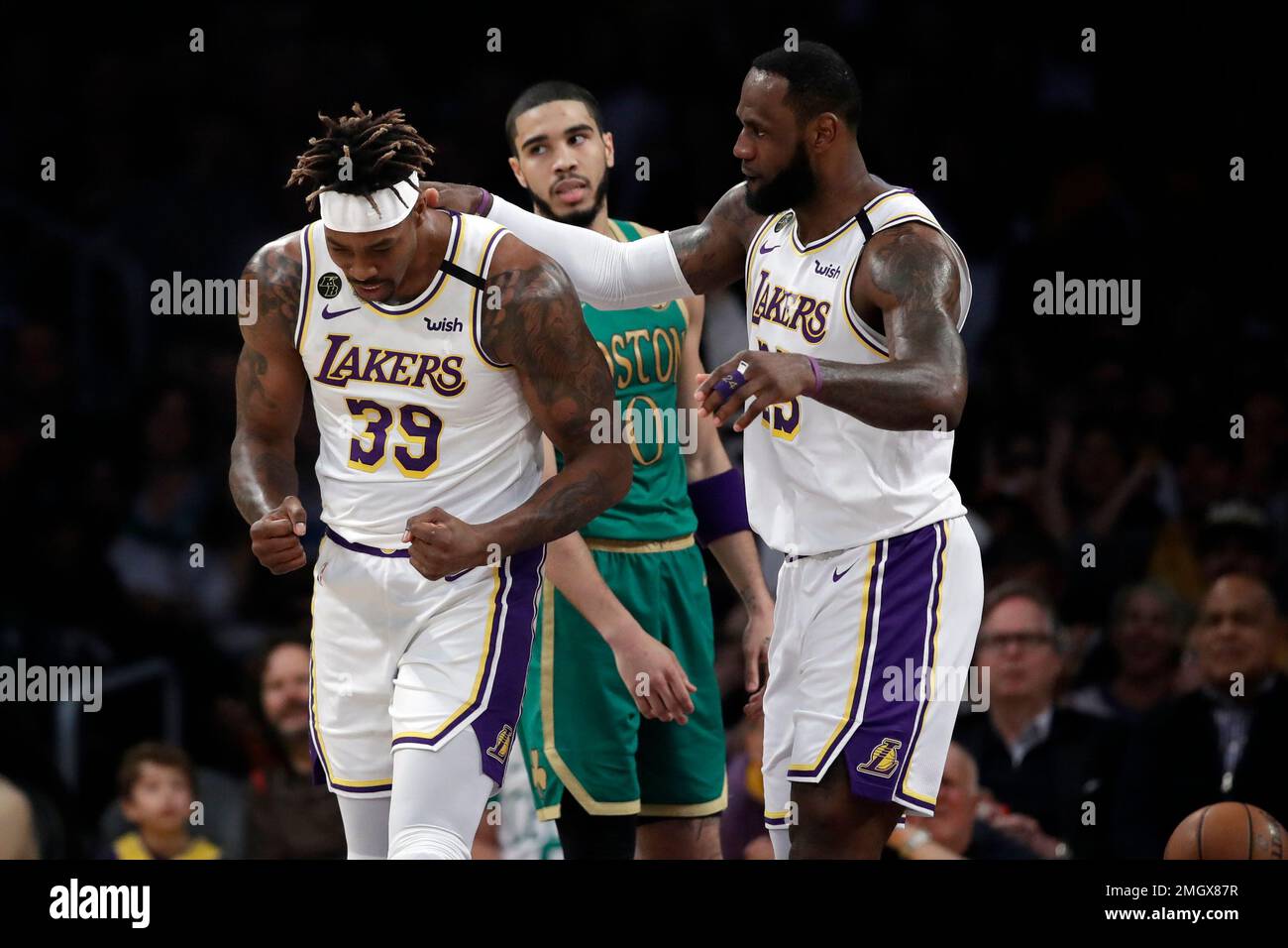 Los Angeles Lakers' Dwight Howard (39) celebrates after scoring with ...