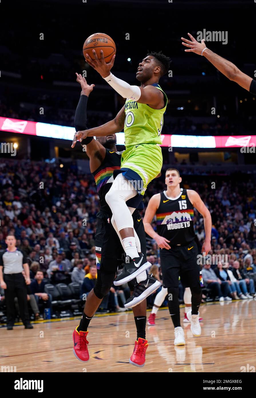 Minnesota Timberwolves forward Kelan Martin (30) goes up to shoot ...