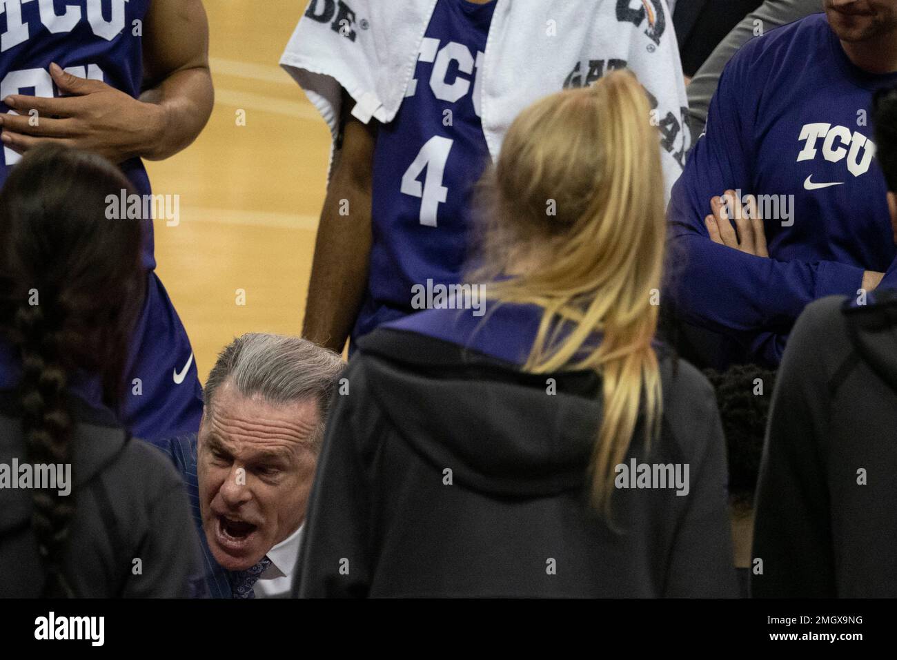 TCU head coach Jamie Dixon talks to his team during the first half of ...