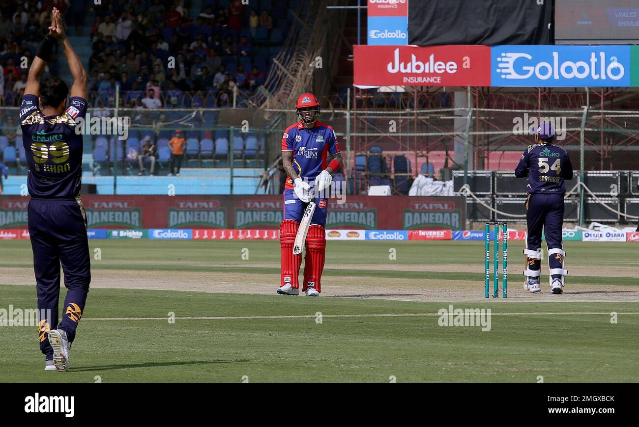 Karachi Kings batsman Alex Hales, center, walks back to pavilion after ...