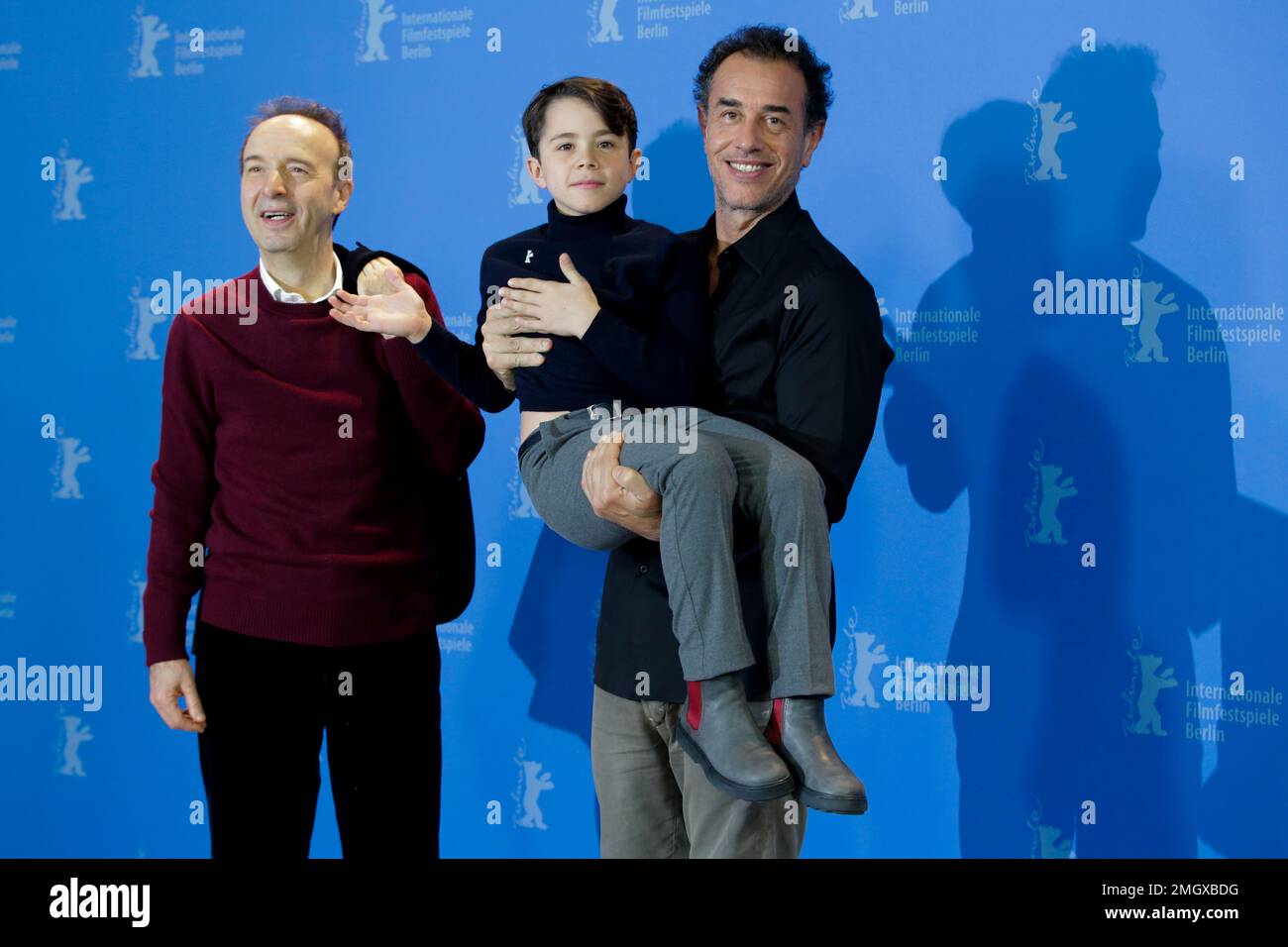 Actors Roberto Benigni, left, Federico Ielapi, centre, and director ...