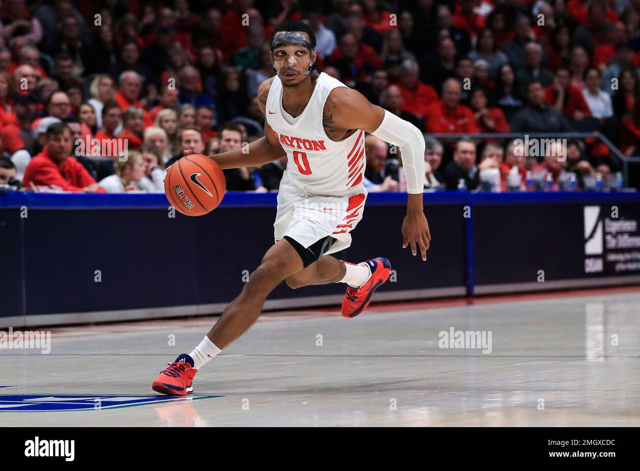 Dayton's Rodney Chatman (0) controls the ball in the first half of an ...