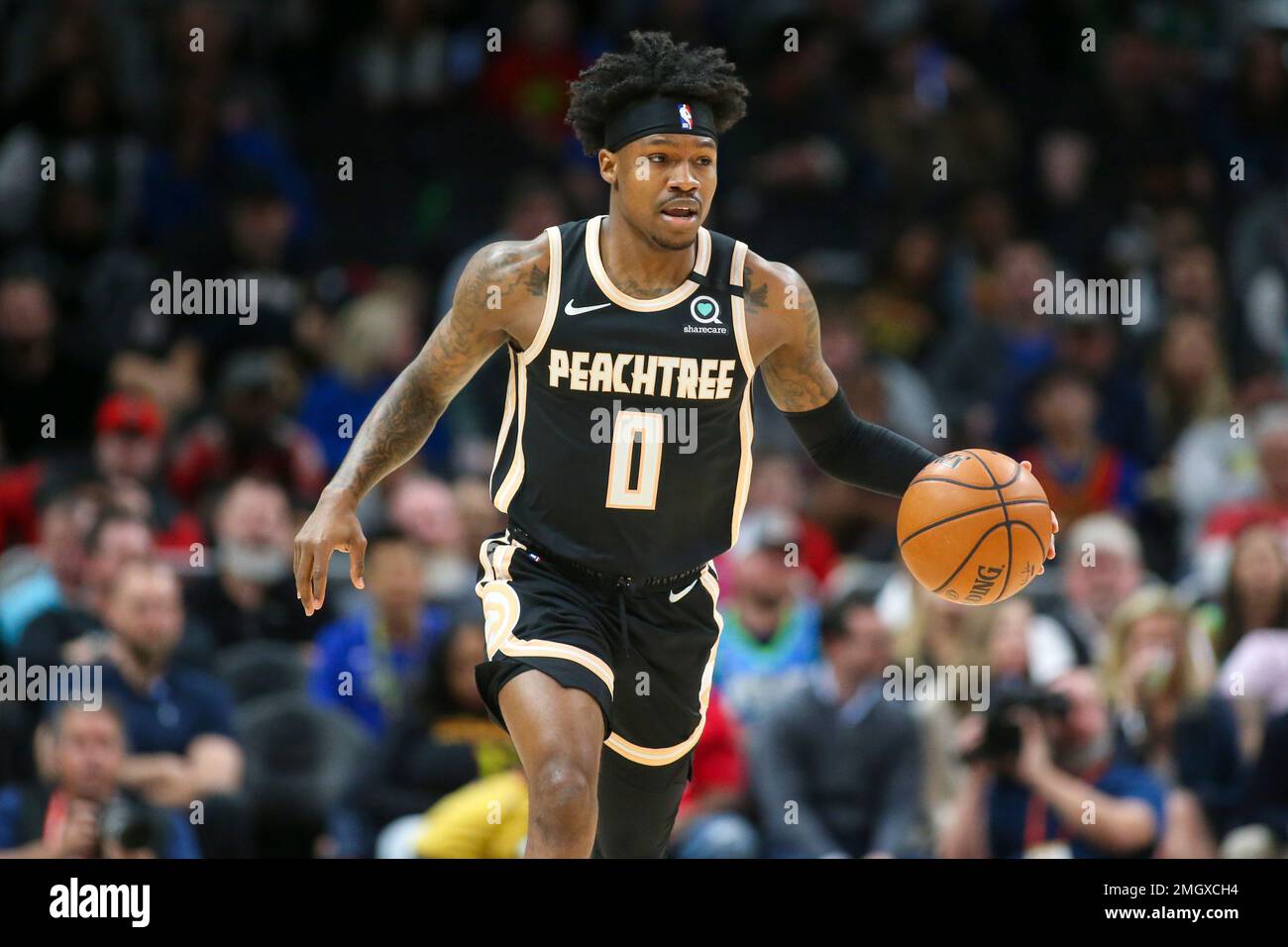 Atlanta Hawks guard Brandon Goodwin (0) dribbles in the first half of ...