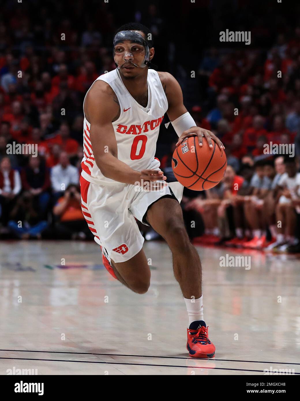 Dayton's Rodney Chatman (0) controls the ball in the first half of an ...