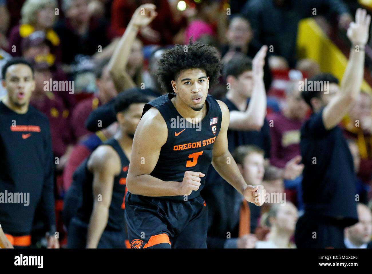 Oregon State's Ethan Thompson (5) reacts after hitting a three pointer ...