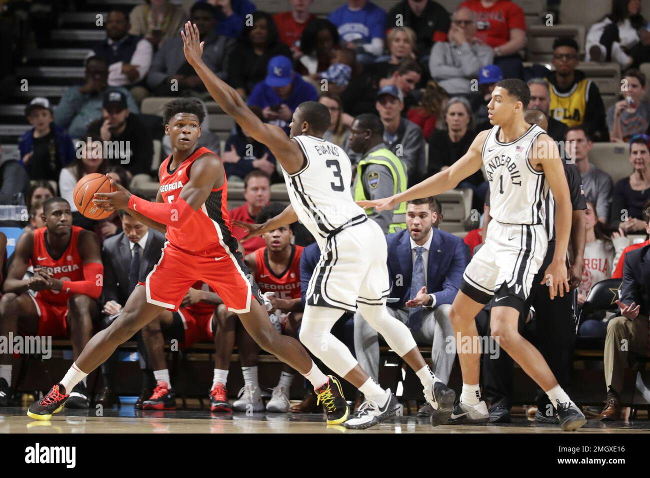 Georgia guard Anthony Edwards, left, is defended by Vanderbilt's ...