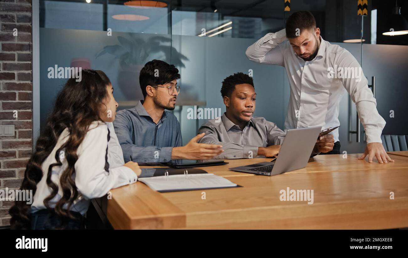 Diverse people in office upset multiethnic multiracial business team ...