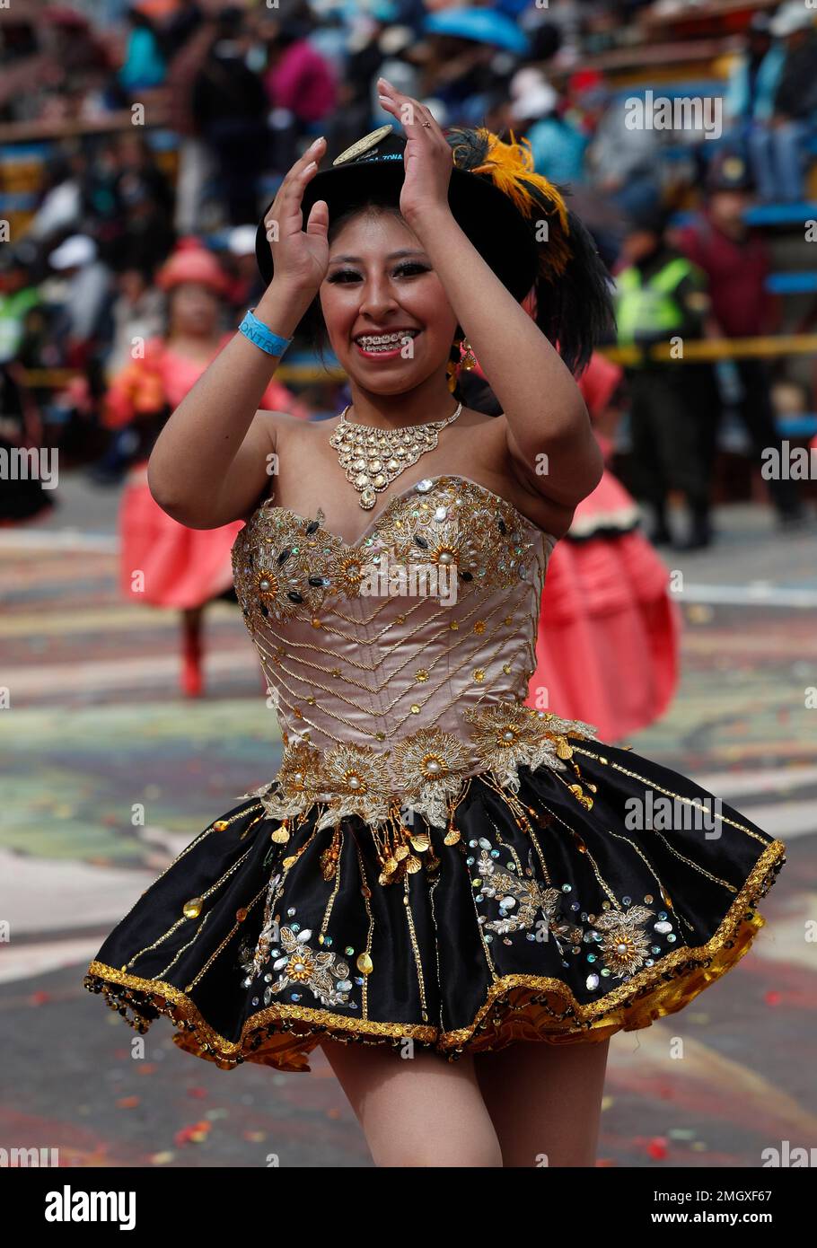 A woman performs in the traditional "Morenada" dance during Carnival, in Oruro, Bolivia ...
