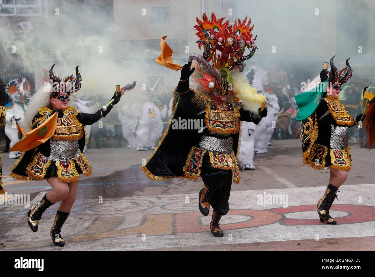 Dancers perform the traditional "Diablada," or Dance of the Devils ...